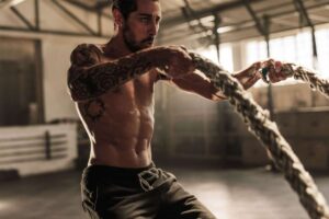 Top 12 Battle Rope Exercises With A Full Workout Plan