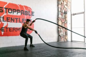 Top 12 Battle Rope Exercises With A Full Workout Plan